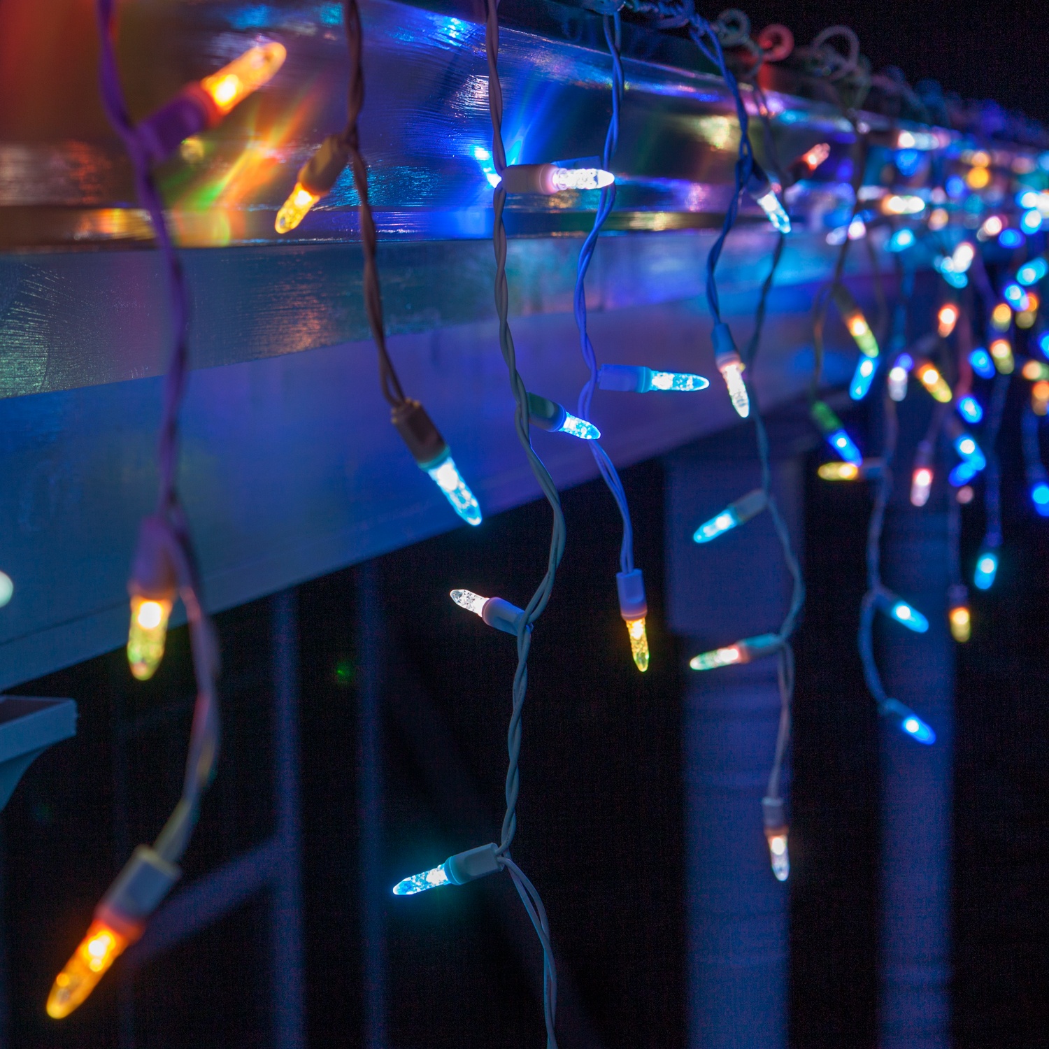 Multicolor M5 LED Color Change Icicle Lights on White Wire ...